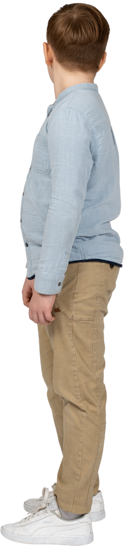 Side view of a boy looking aside Photo