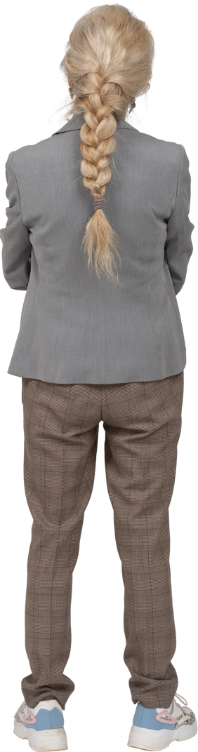 Back view of an old lady in suit Photo