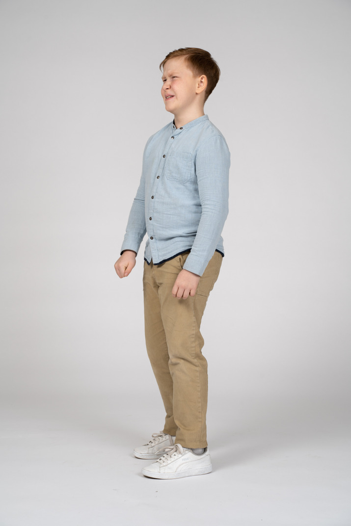 Side view of an angry boy Photo