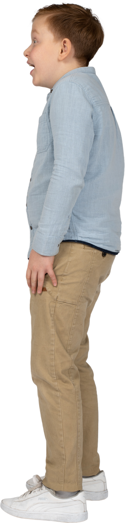 Side view of an impressed boy Photo