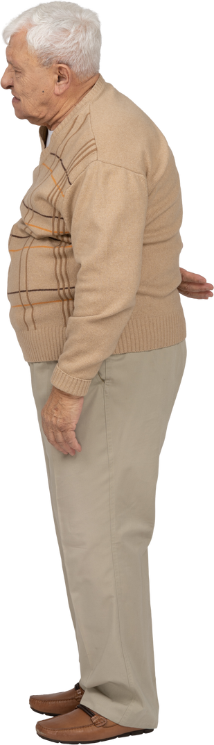 Side view of an old man in casual clothes Photo