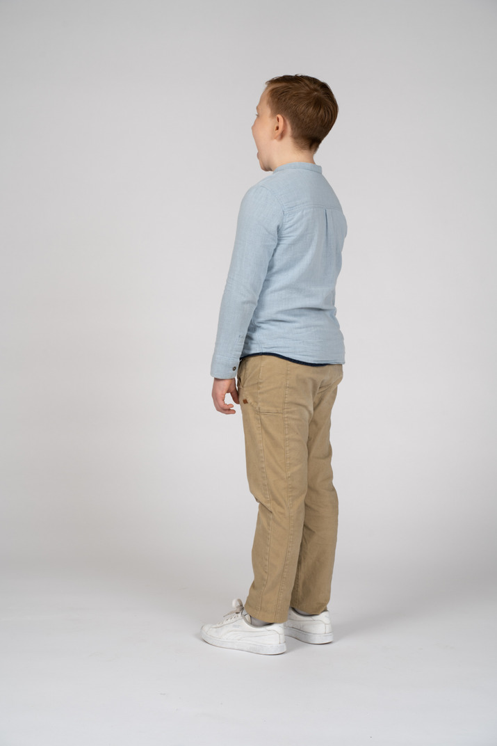 Side view of a boy with surprised face expression Photo