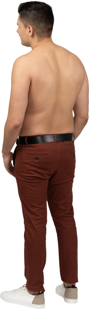Three-quarter back view of a shirtless latino man with folded hands Photo
